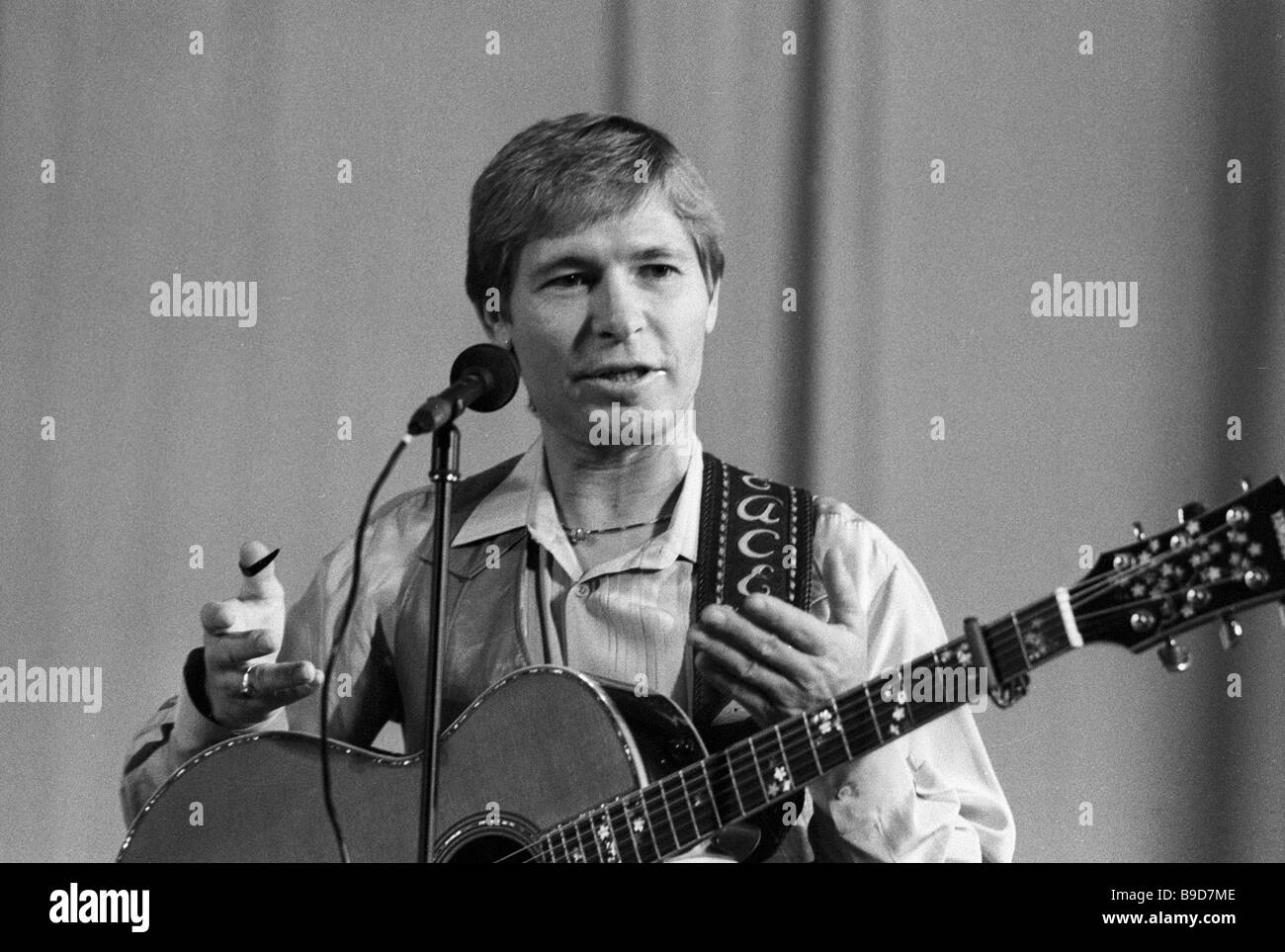 American singer John Denver during a concert Stock Photo - Alamy