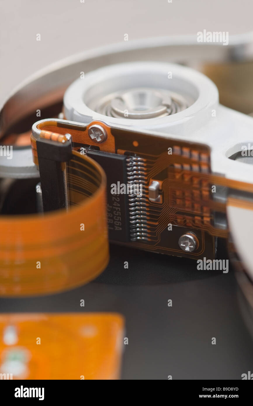 Hard Drive Actuator Arm space orange PC board screws Stock Photo - Alamy