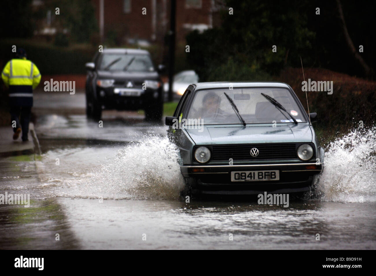 Vehicle driving in floodwater hi-res stock photography and images - Alamy