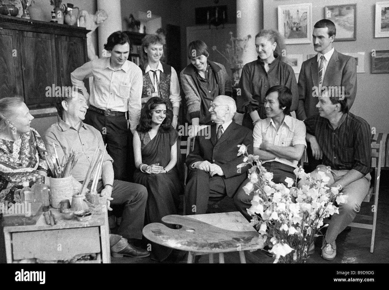Artists Viktor Oreshnikov sitting third from right and Valery Pimenov ...