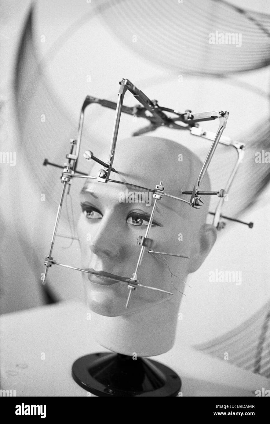 A cranial bone binding apparatus on a mannequin The model was presented ...