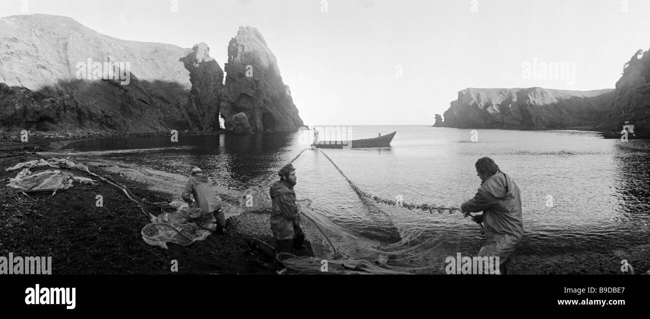 Fishermen from Rodina Motherland kolkhoz fishing for pink salmon with ...