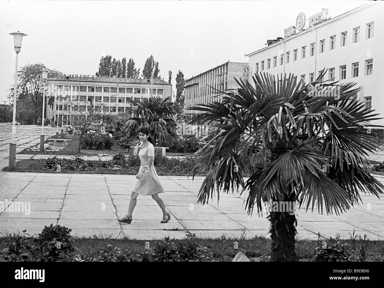 A girl walking down the street in Lenkoran Stock Photo - Alamy