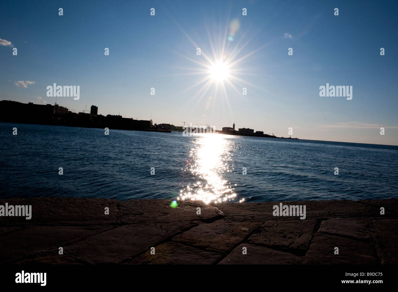 sunset at trieste bay, Molo Audace Stock Photo - Alamy