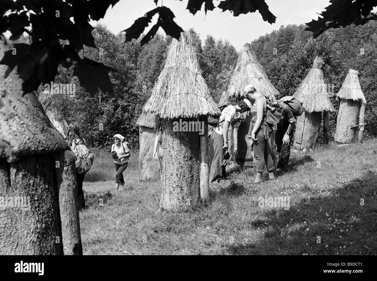 Tourists examine the beehives at the ancient beekeeping museum in the ...