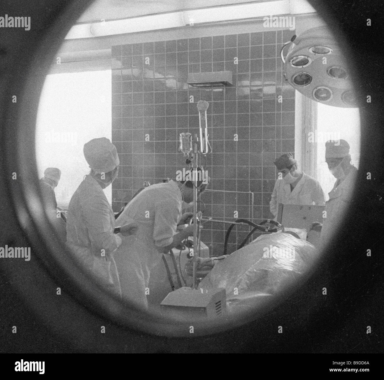 Neurosurgeons in the operating theatre Stock Photo - Alamy
