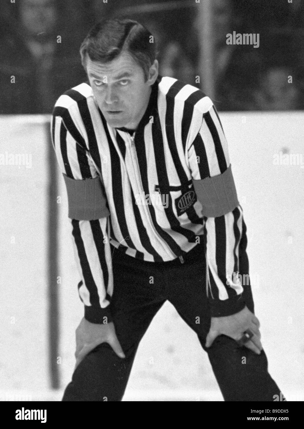 An ice hockey referee Stock Photo - Alamy