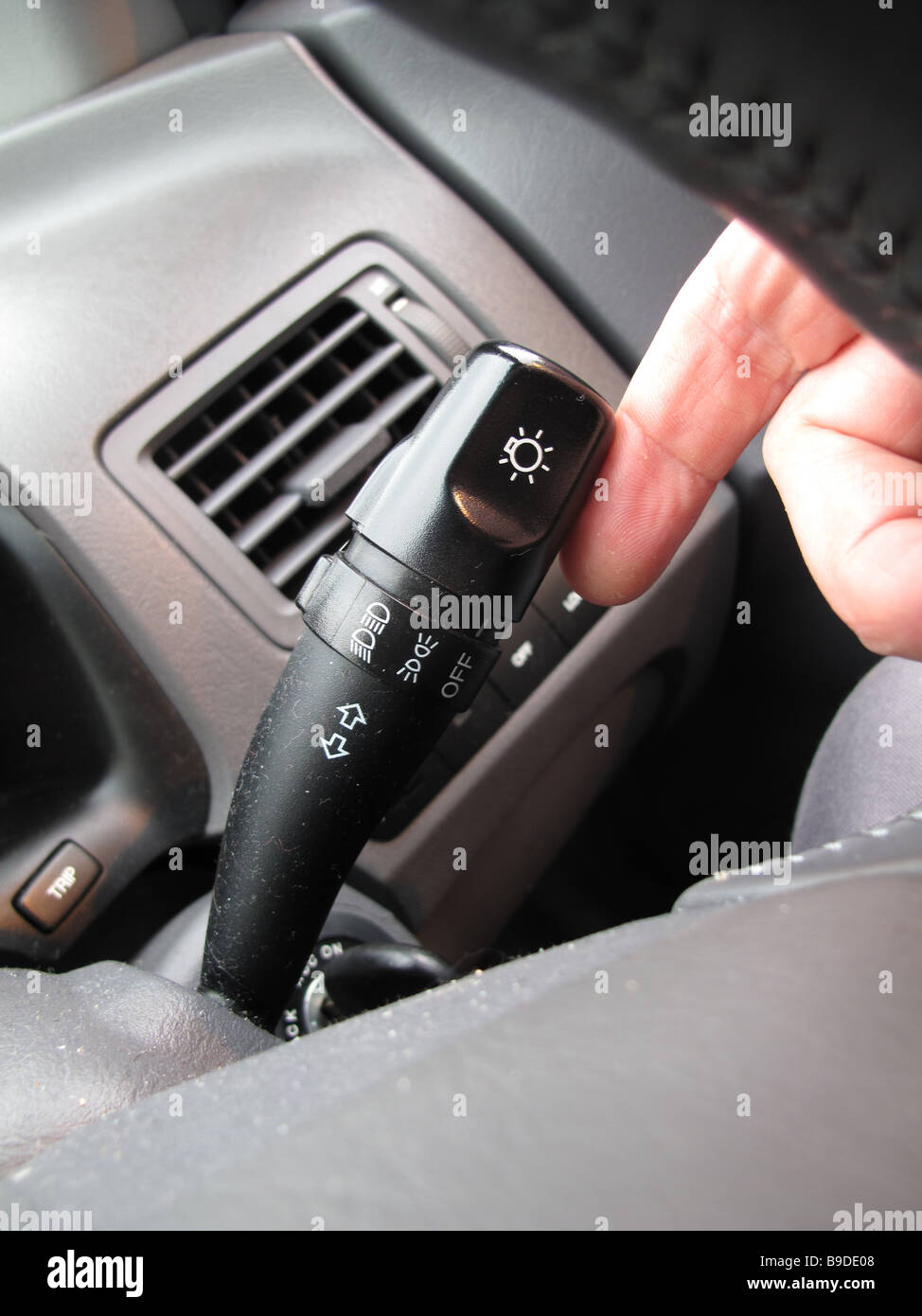 Driver operating turn indicator Stock Photo - Alamy