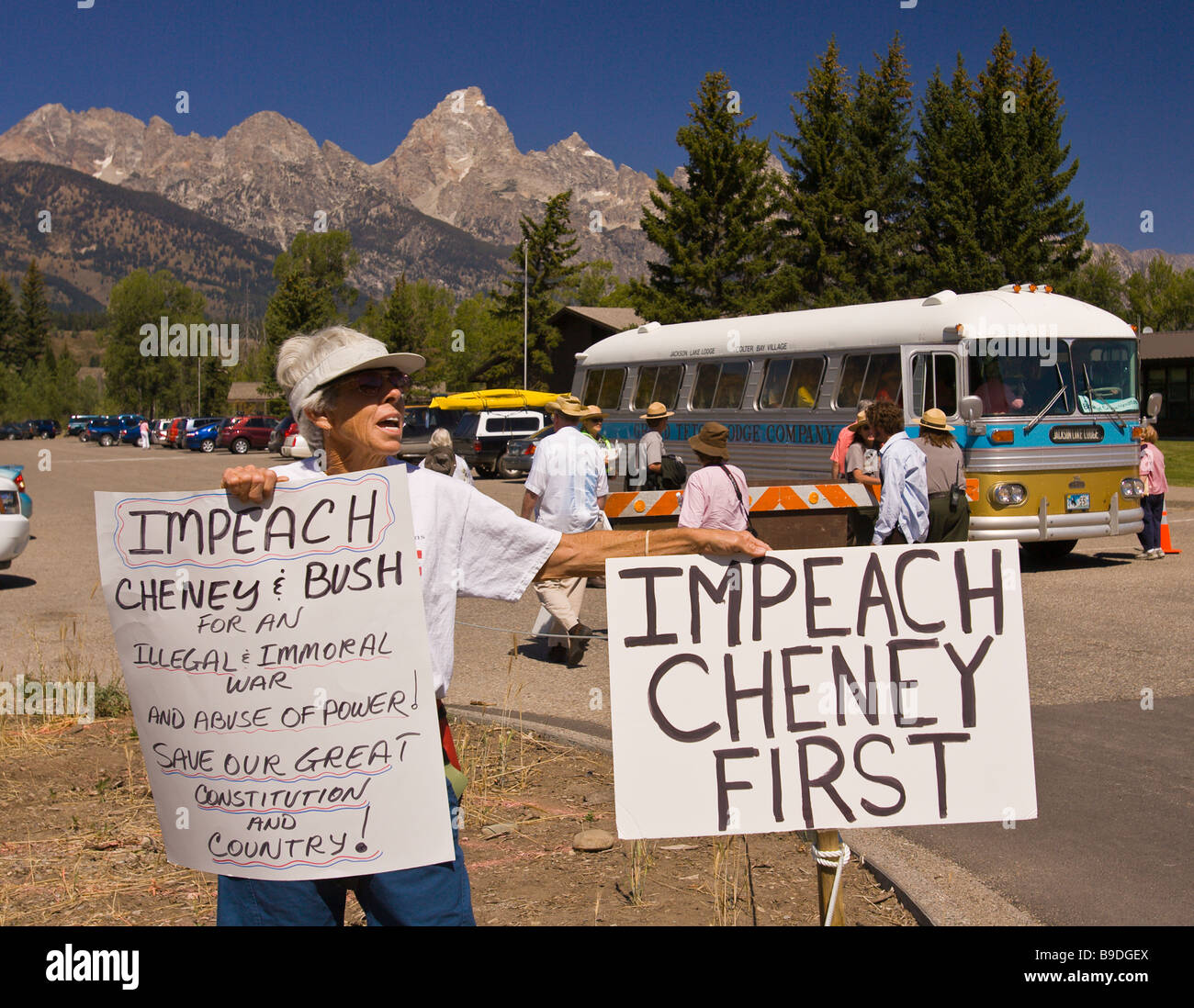 WYOMING USA Demonstrator holds Impeach Cheney signs in front of Teton ...