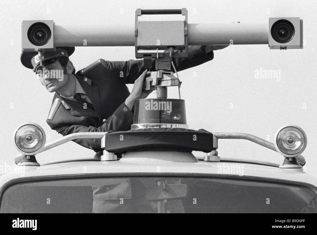 A traffic Police officer performs stereo photographic surveying Stock ...