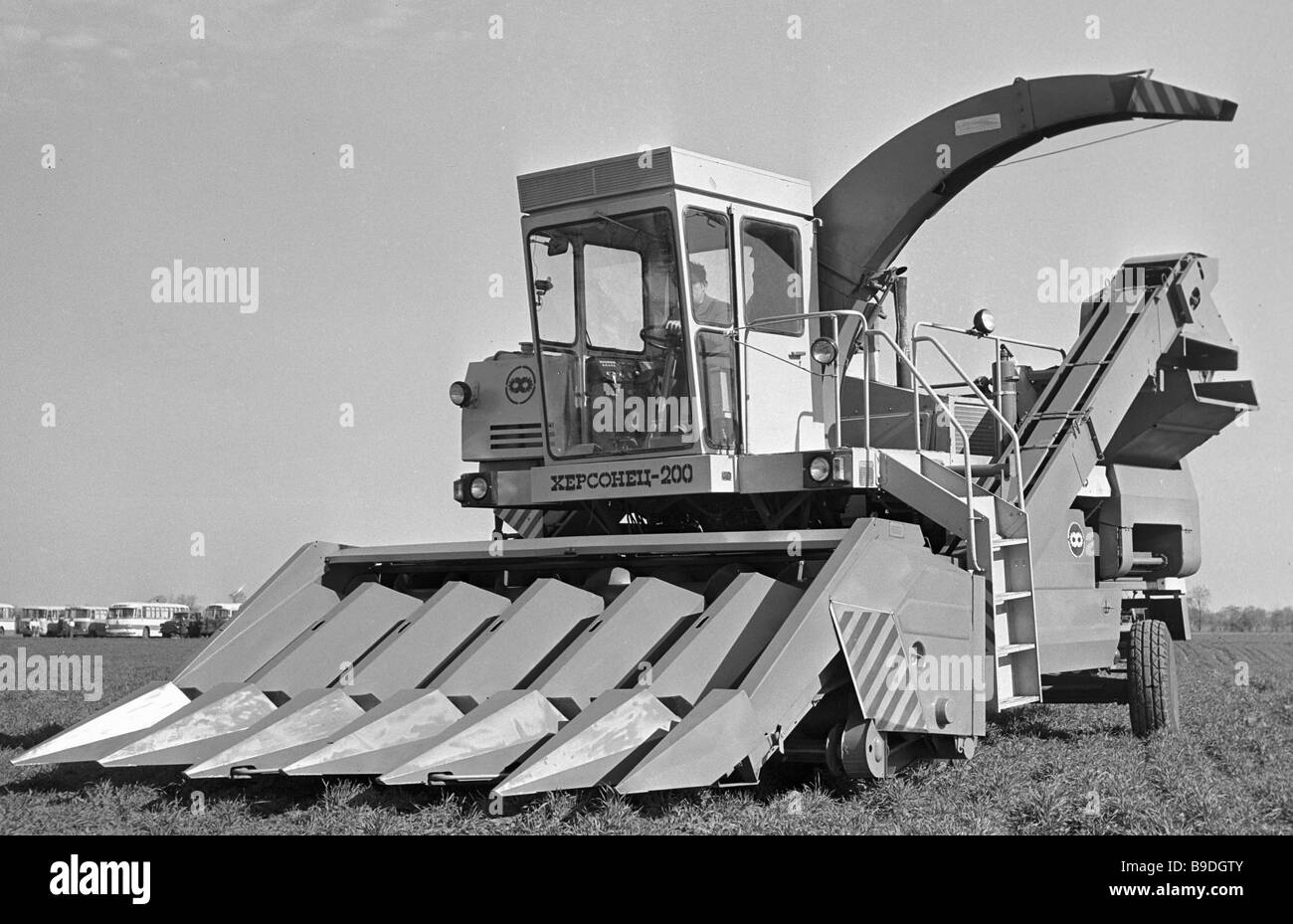A Khersonets 200 self propelled combine harvesting corn Stock Photo - Alamy
