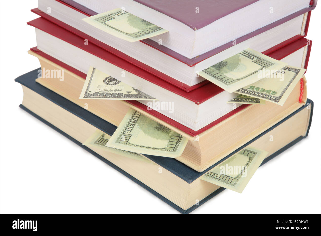 Cup of books with dollars Stock Photo - Alamy