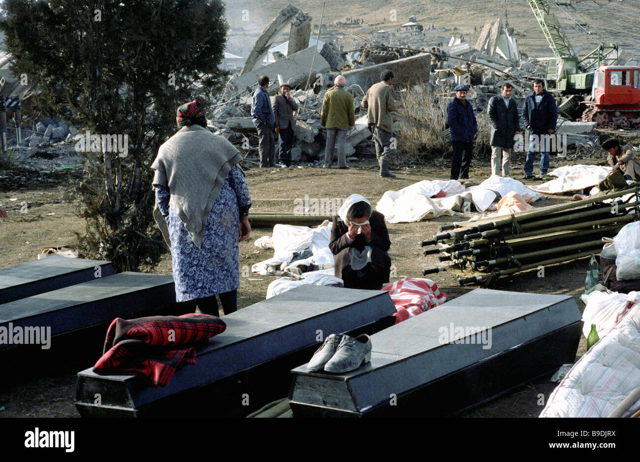 People mourning their relatives after a magnitude 10 earthquake Stock ...