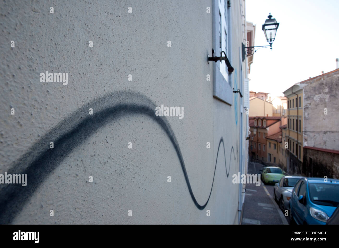 Curved painted line on the street wall Stock Photo - Alamy