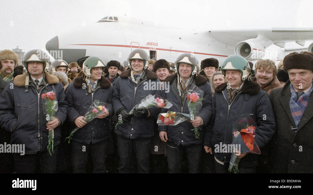 An air crew receives congratulations after an AN 225 Mriya Dream super ...