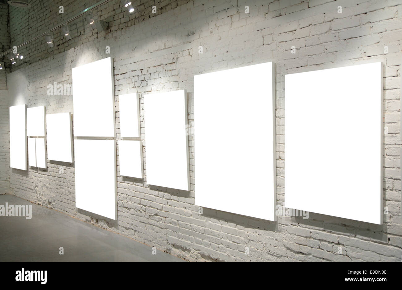 Frames on a brick wall Stock Photo - Alamy