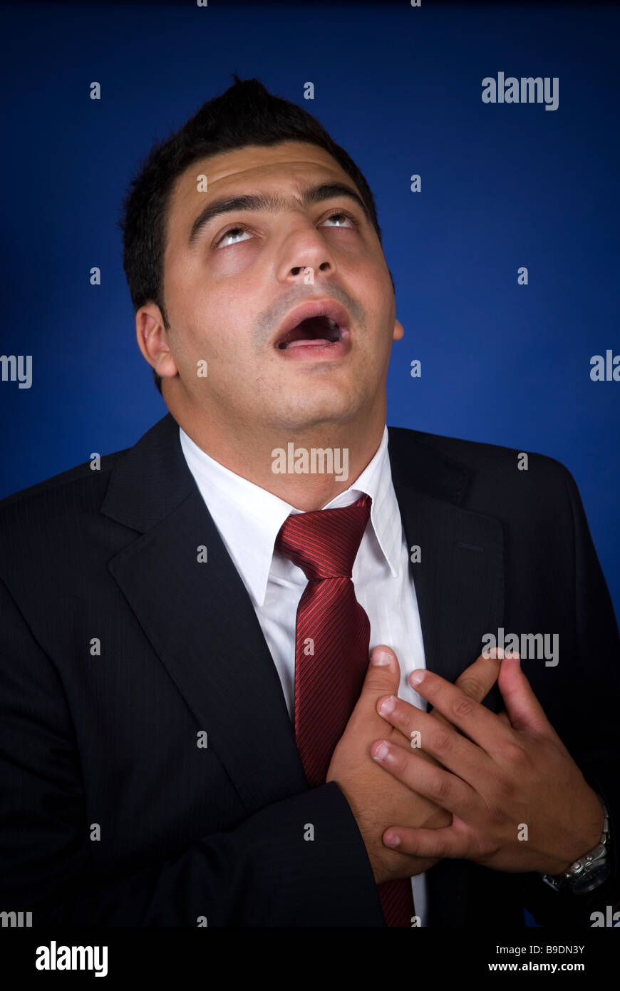Man clutching chest hand hi-res stock photography and images - Alamy