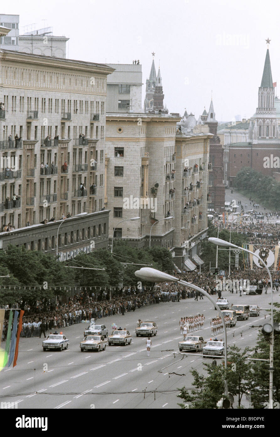 Looking on Olympic Flame relay along Gorky Street in Moscow Stock Photo ...
