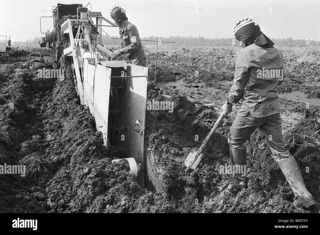 Laying closed drainage system in the Tashkentsky state farm Stock Photo ...