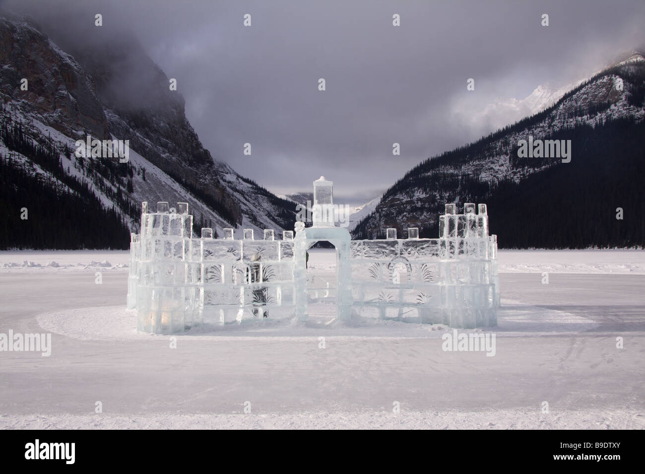 Ice castle on the lake behind the Chateau Lake Louise Hotel near Banff ...