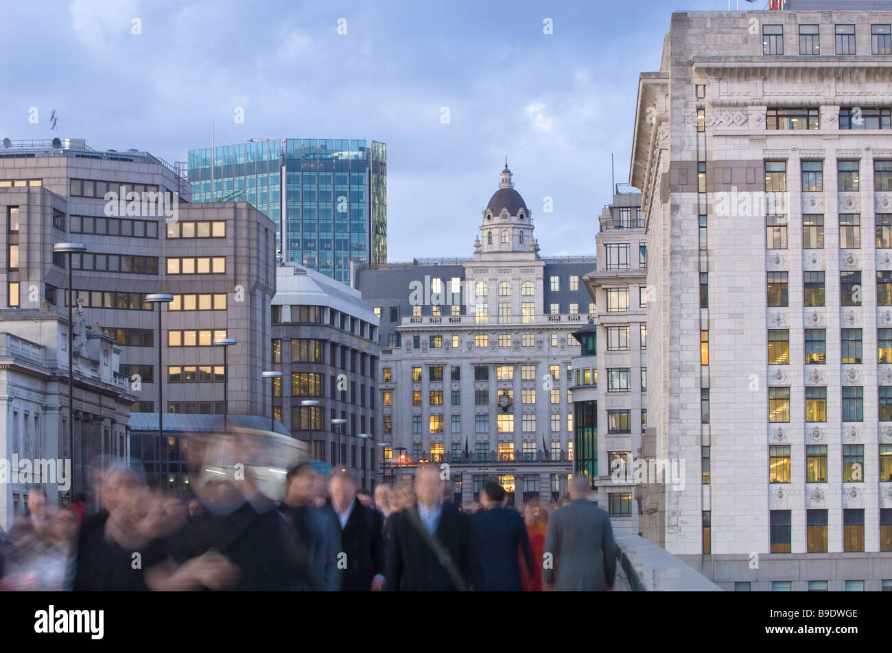 Commuters walking over London Bridge London United Kingdom Stock Photo ...