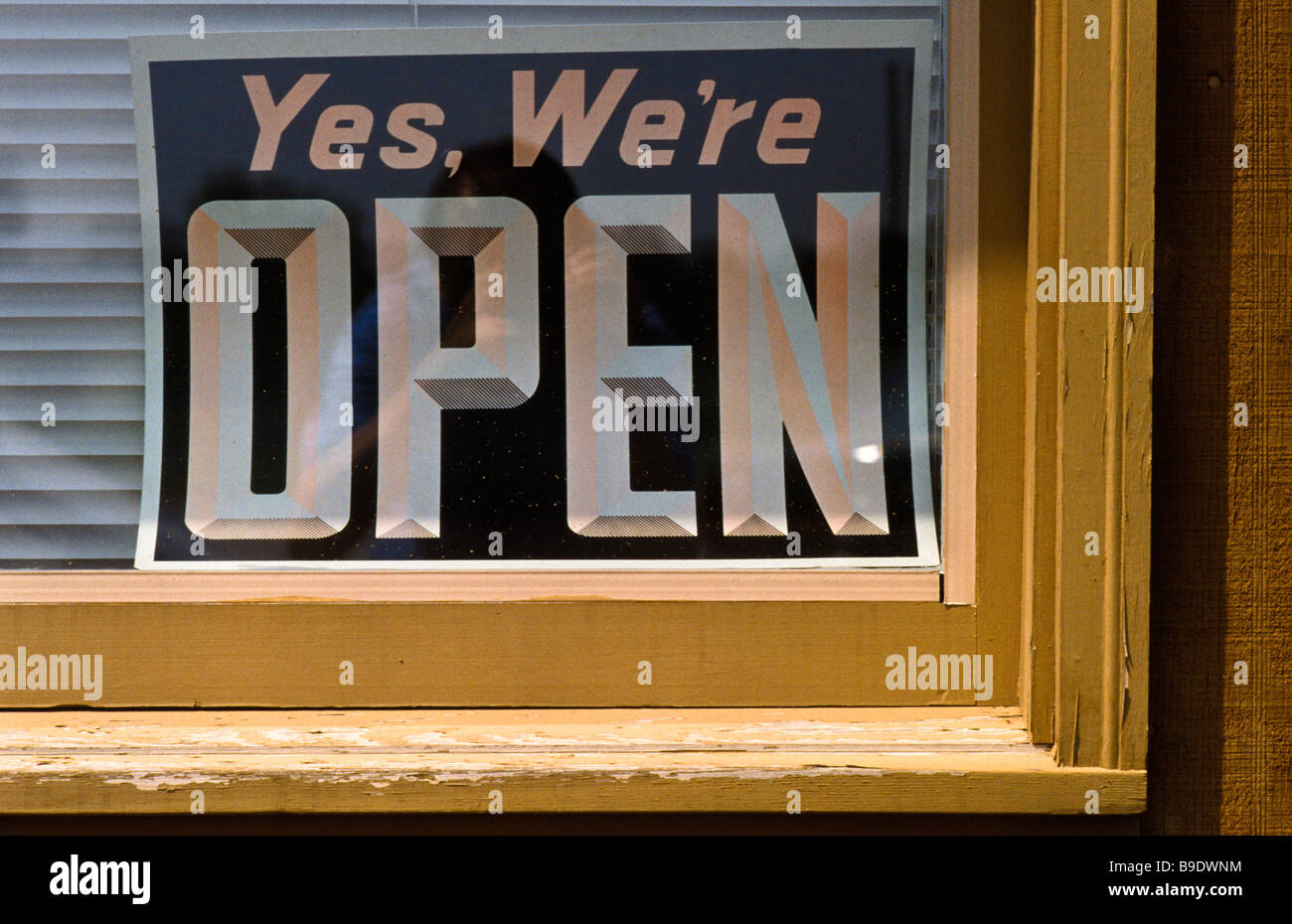 store window yes we're open sign Stock Photo - Alamy
