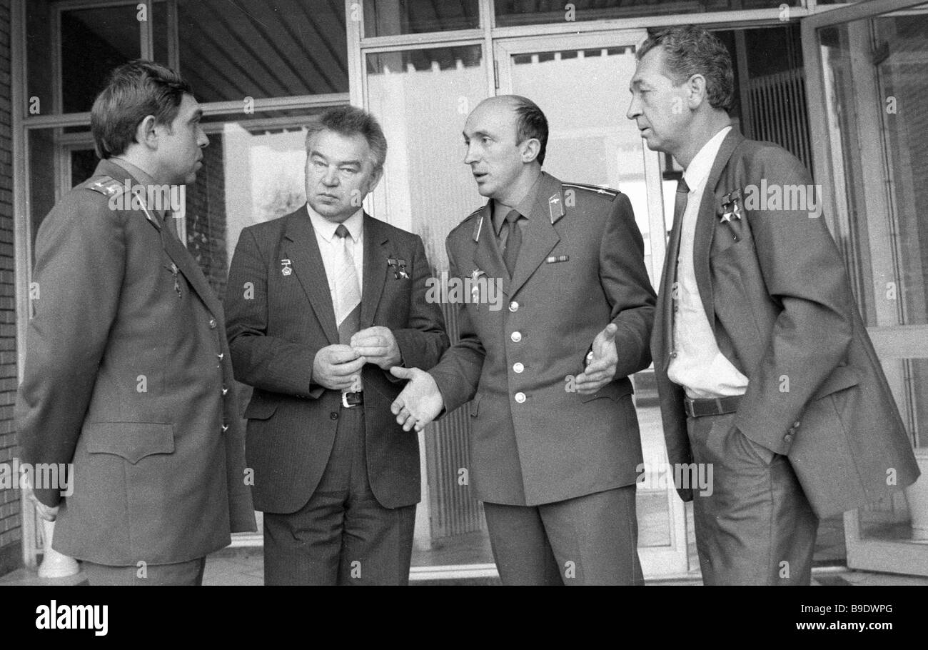 The Soyuz 14 spacecraft crew before their venture Left to right ...