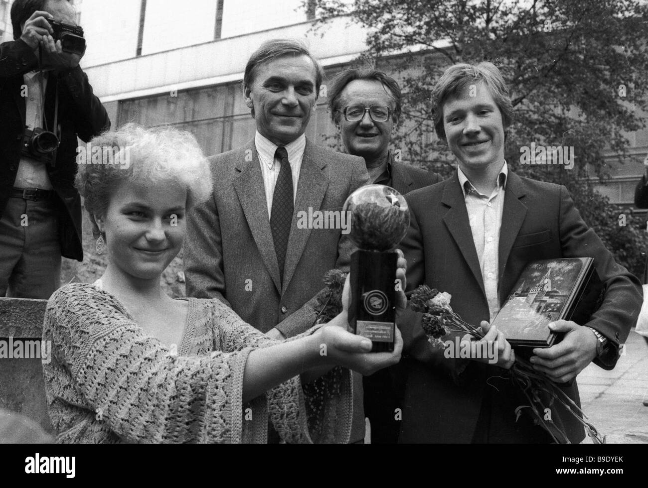 Film director Elem Klimov second from left scriptwriter Ales Adamovich ...