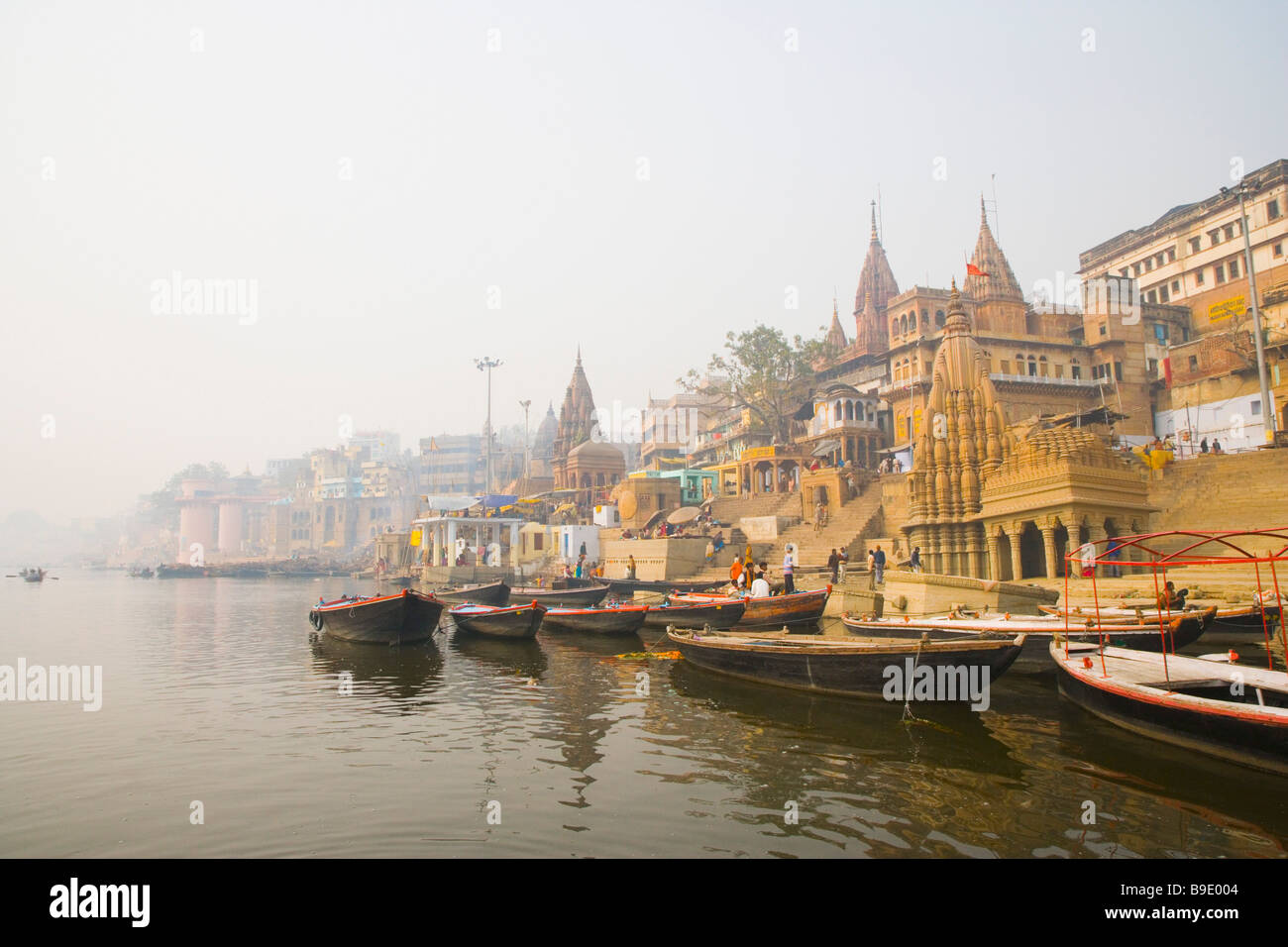 Boats moored at the riverbank, Scindia Ghat, Ganges River, Varanasi ...