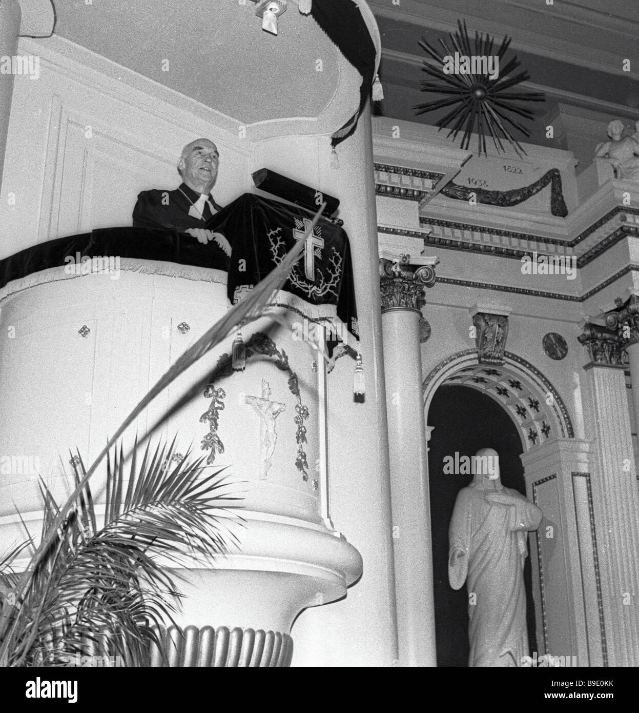 A Catholic priest delivering a sermon in the Church of Christ Stock ...