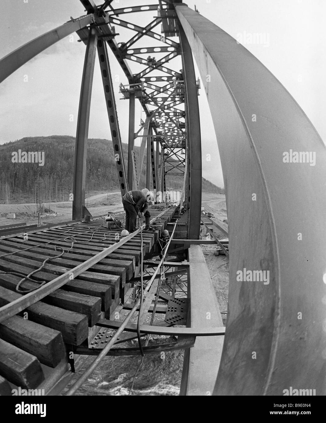 Construction of railroad bridge over Tyya River along Baikal Amur ...