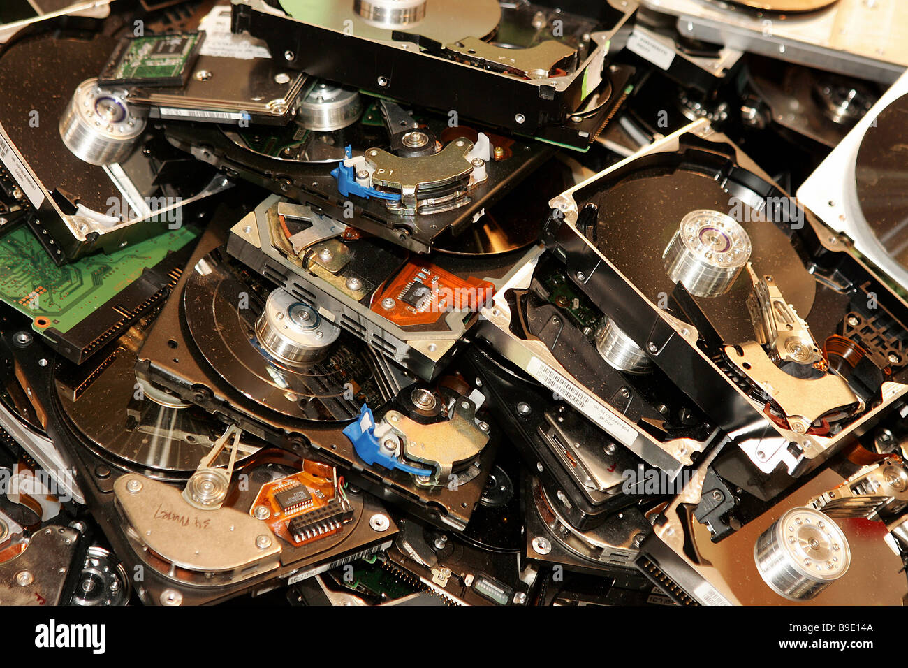 Pile of disused hard discs Stock Photo - Alamy