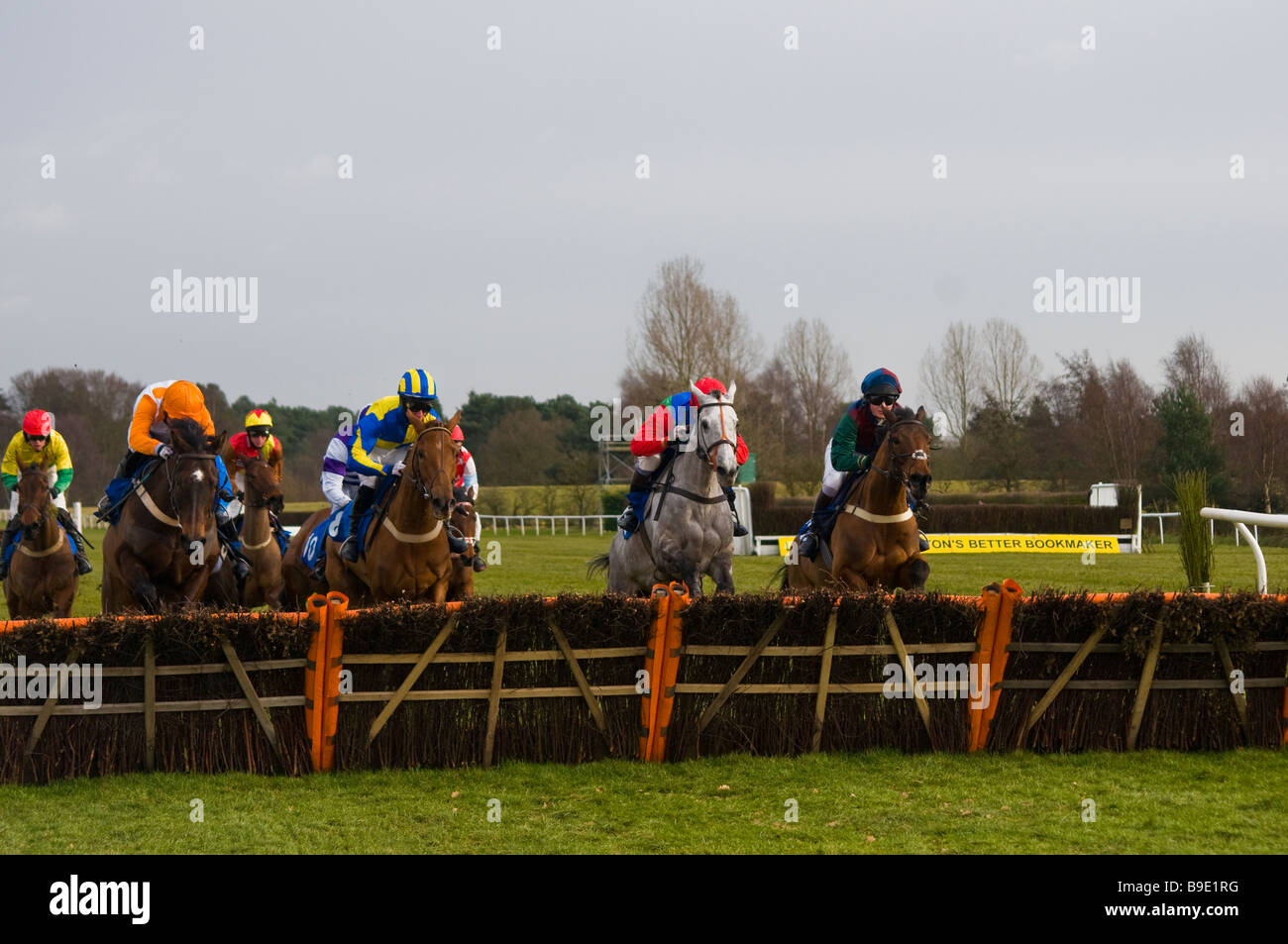 A hurdle race at Market Rasen races, Lincolnshire, England Stock Photo ...