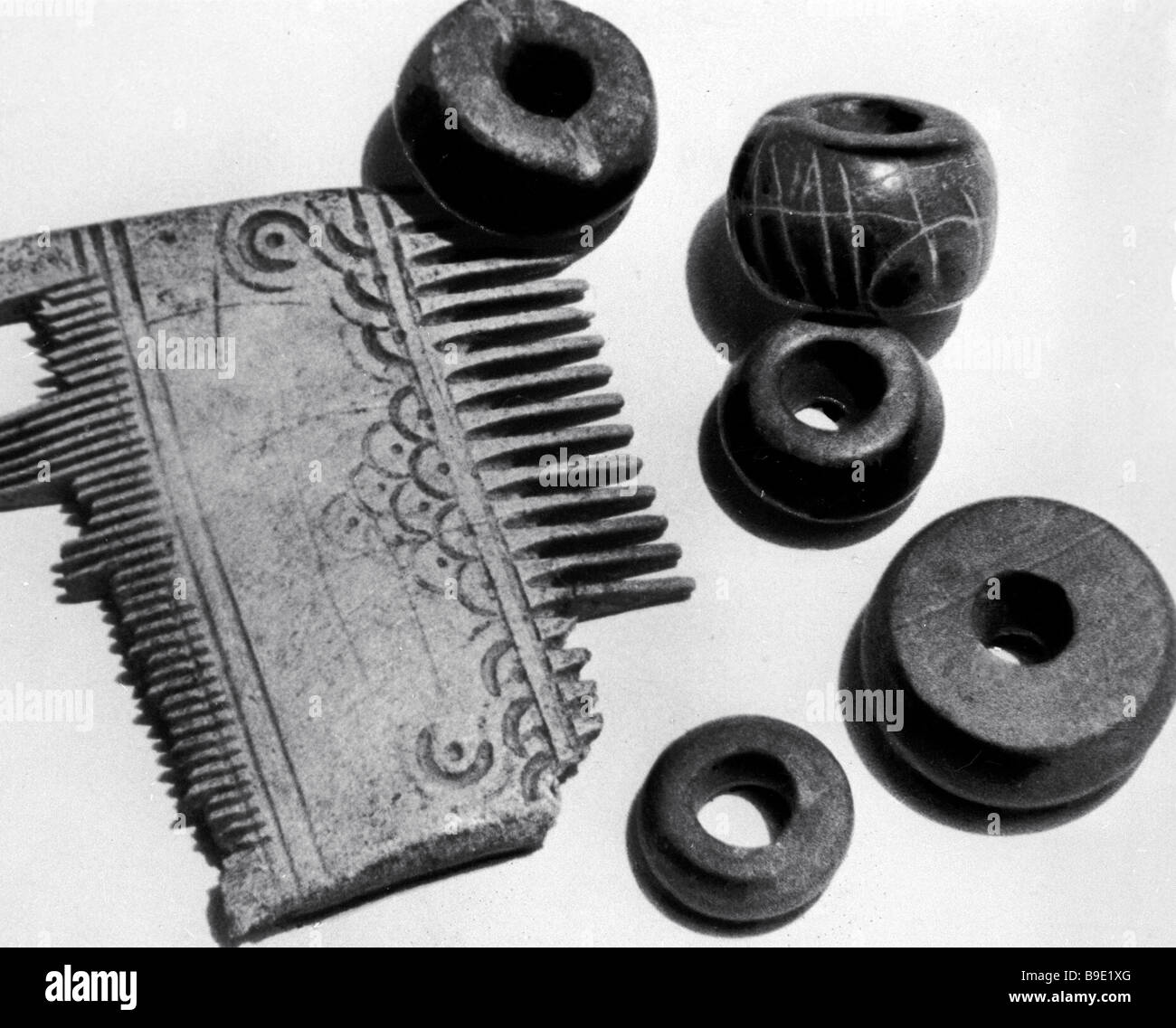 The bone comb and slate spinners plummets for spindles 12th century ...