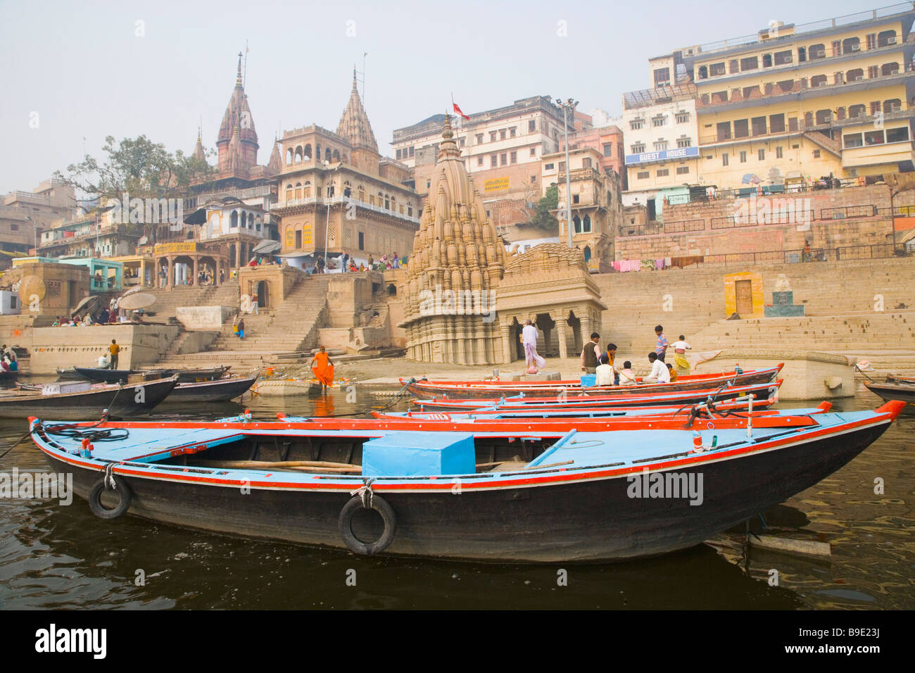 Boats moored at the riverbank, Scindia Ghat, Ganges River, Varanasi ...