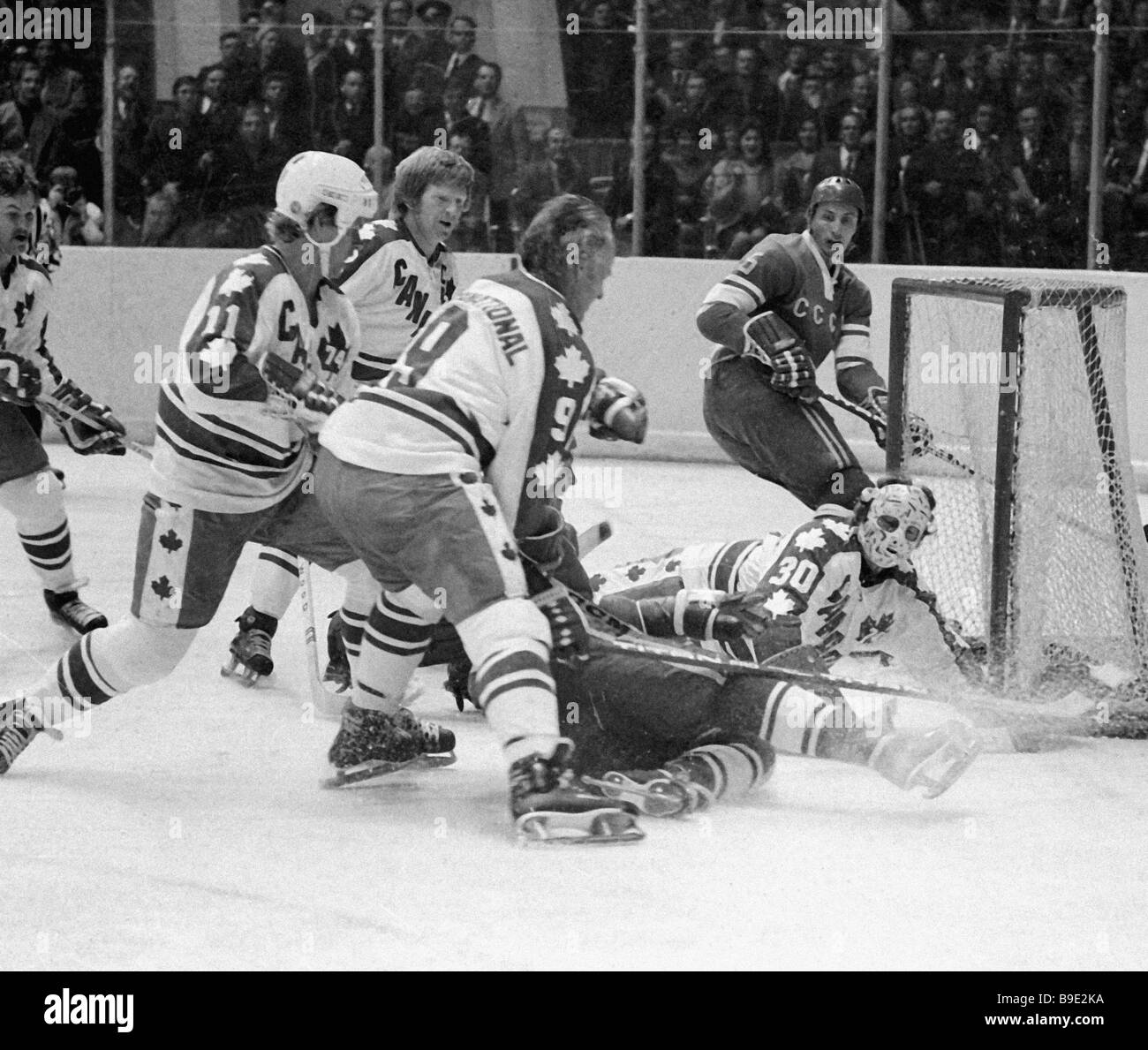 A dramatic moment at the goalmouth for Canadian goalkeeper Gerry ...
