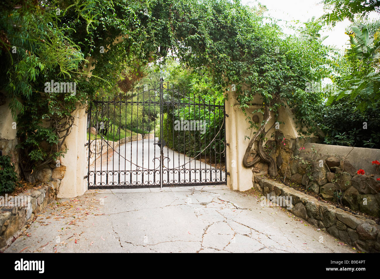 Large closed wrought iron gate Stock Photo - Alamy