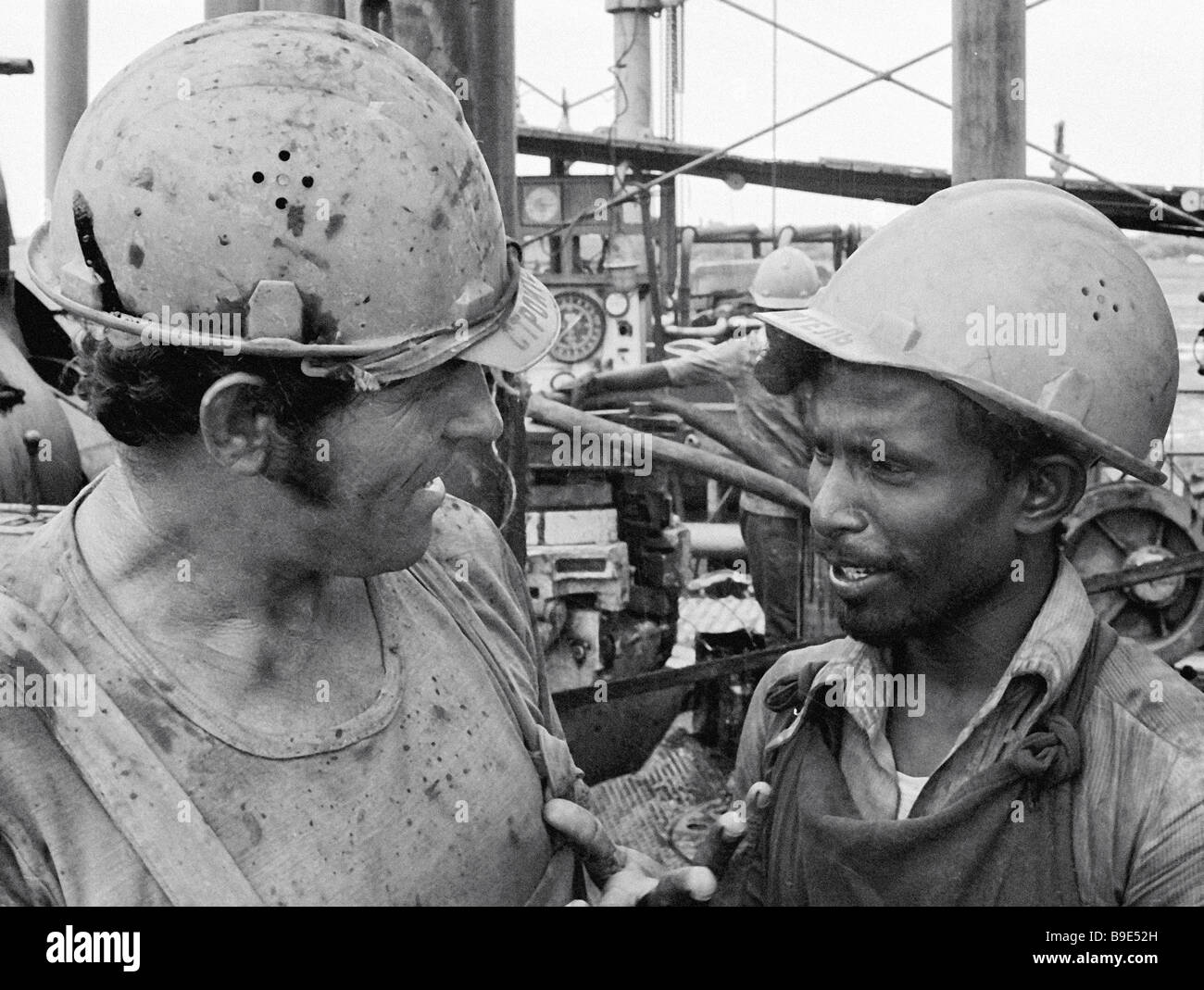 Soviet and Indian workers at a drill well Stock Photo - Alamy