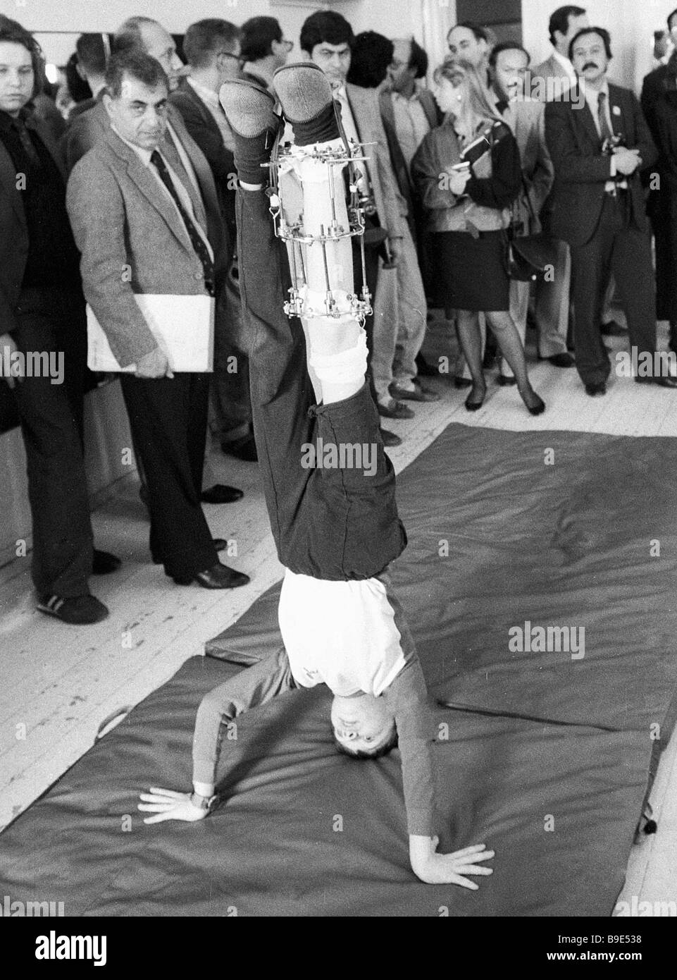 Soviet and foreign journalists watching remedial gymnastics exercises ...