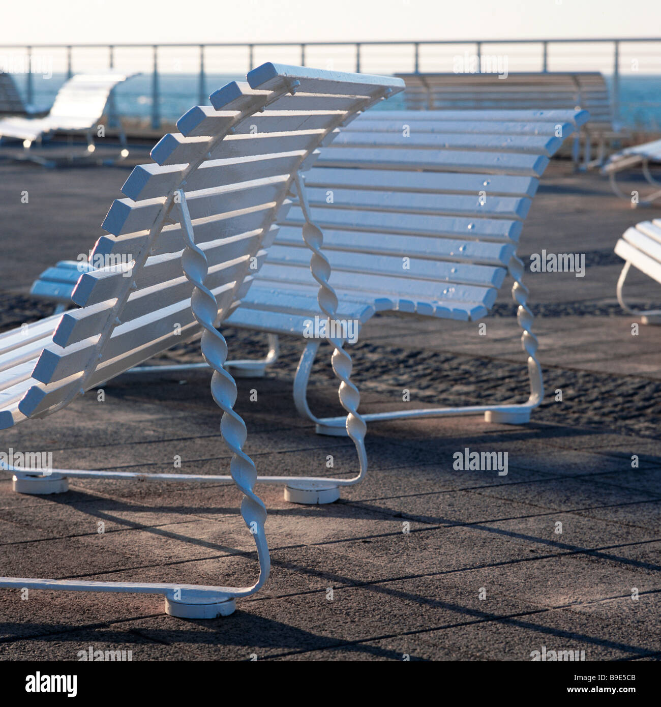 Benches on a promenade, Ostseebad Kuehlungshborn, Germany Stock Photo ...
