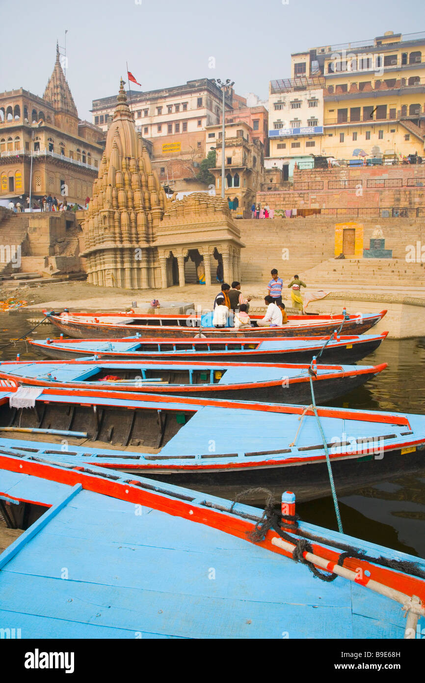 Boats moored at the riverbank, Scindia Ghat, Ganges River, Varanasi ...