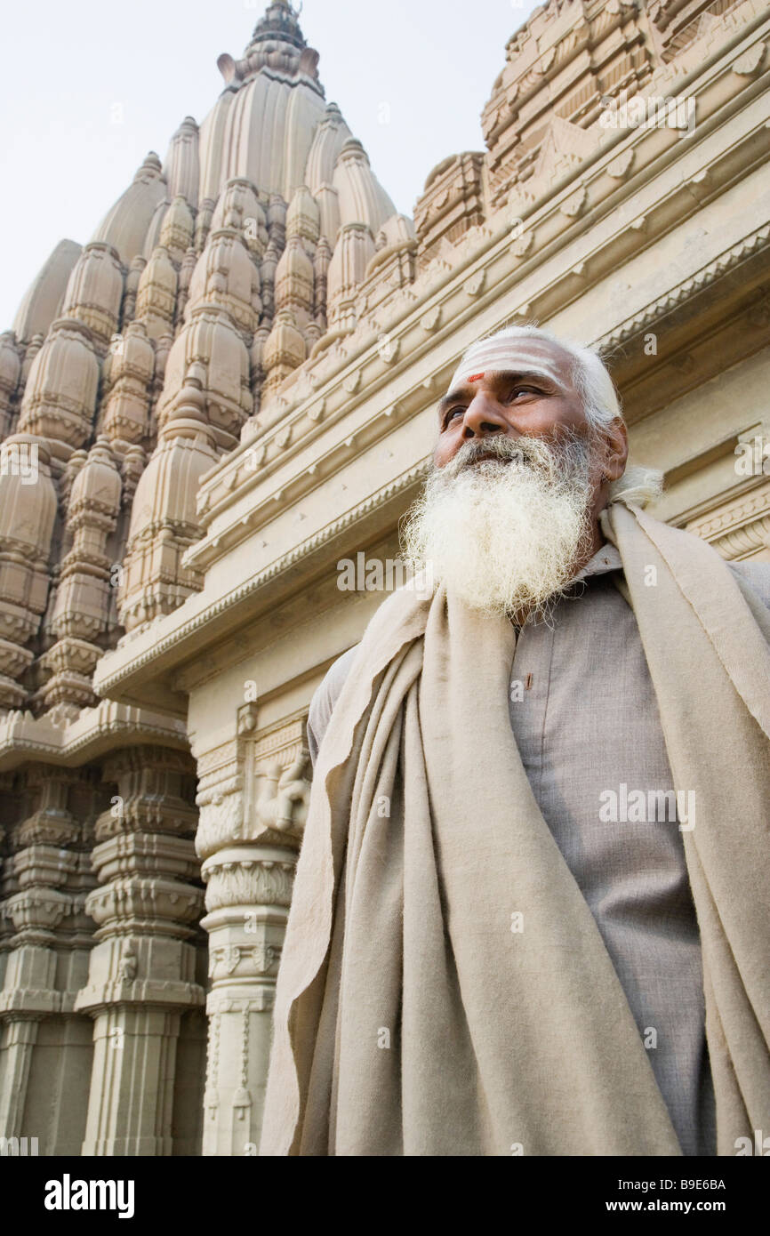 Sadhu standing in a temple, Scindia Ghat, Ganges River, Varanasi, Uttar ...