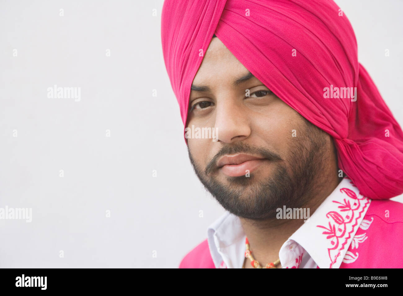 Portrait of a man smirking, Amritsar, Punjab, India Stock Photo - Alamy