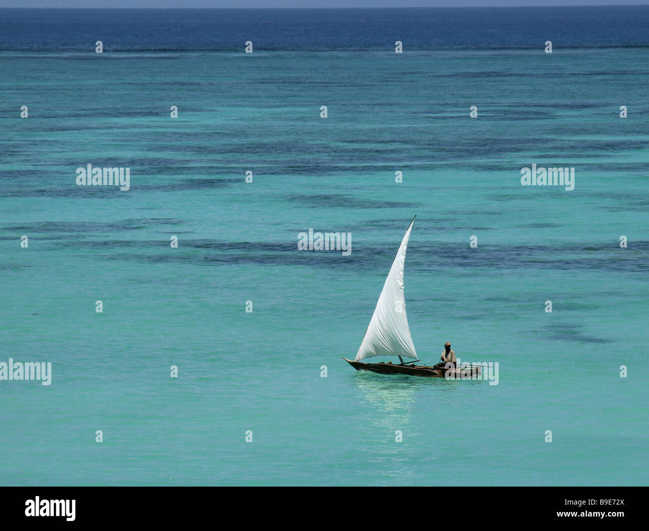 small dugout outrigger boat or ngalawa (often wrongly called dhow ...