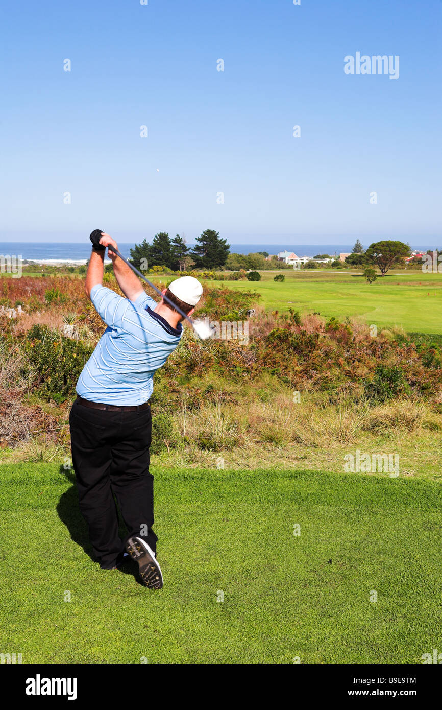 Man playing golf Stock Photo - Alamy
