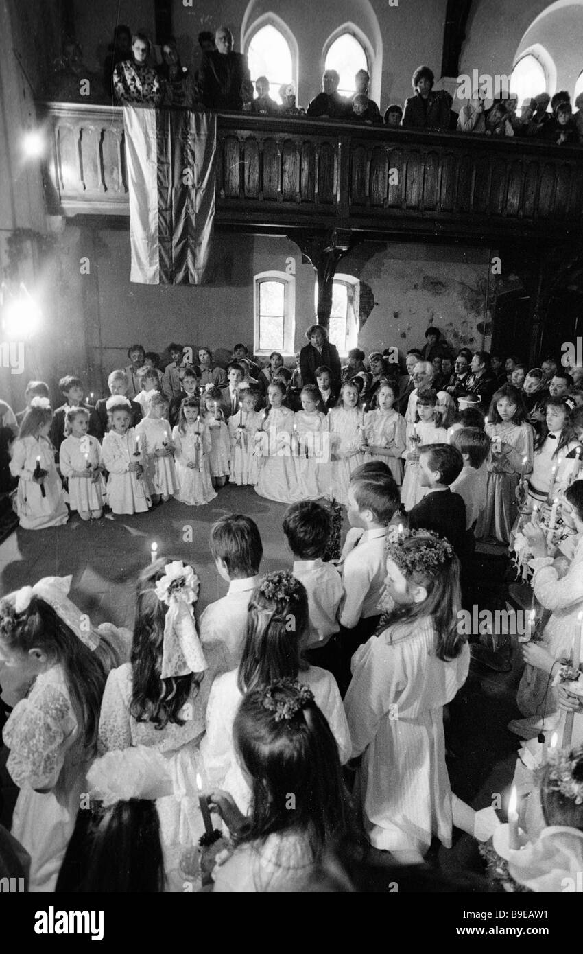 Children recite excerpts from the Scripture during confirmation in a ...