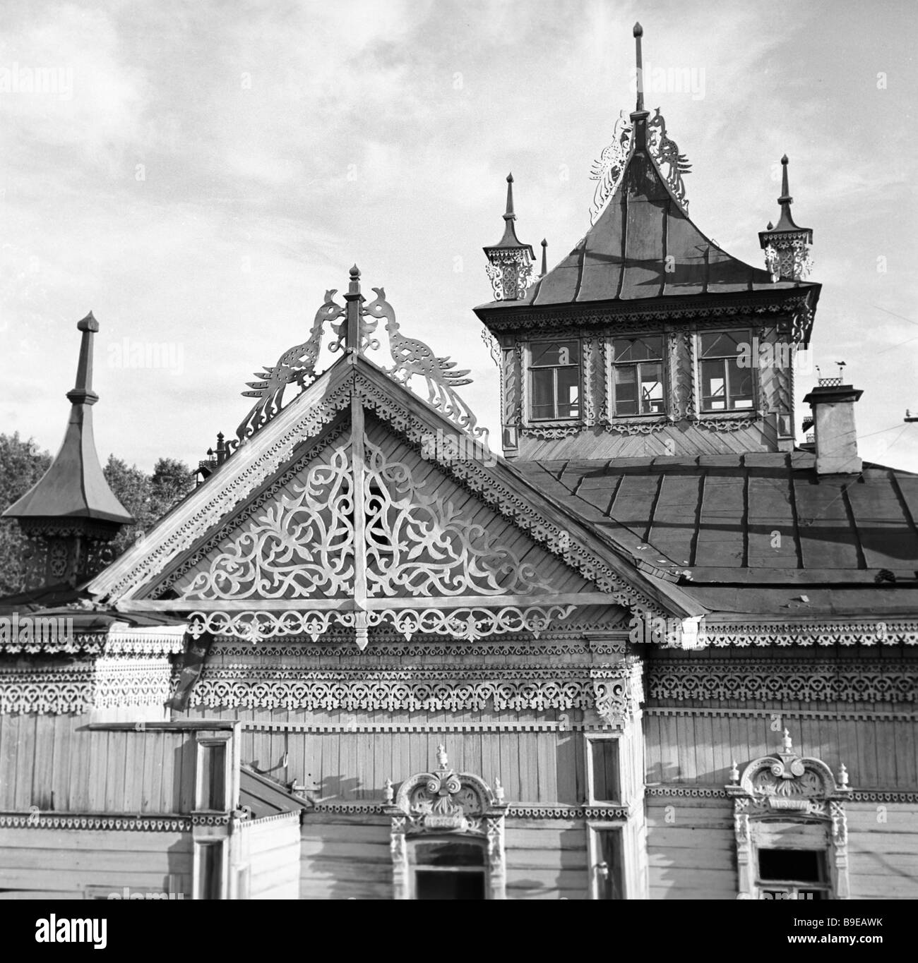 Houses adorned with openwork of abstract firebirds spires and marquees ...