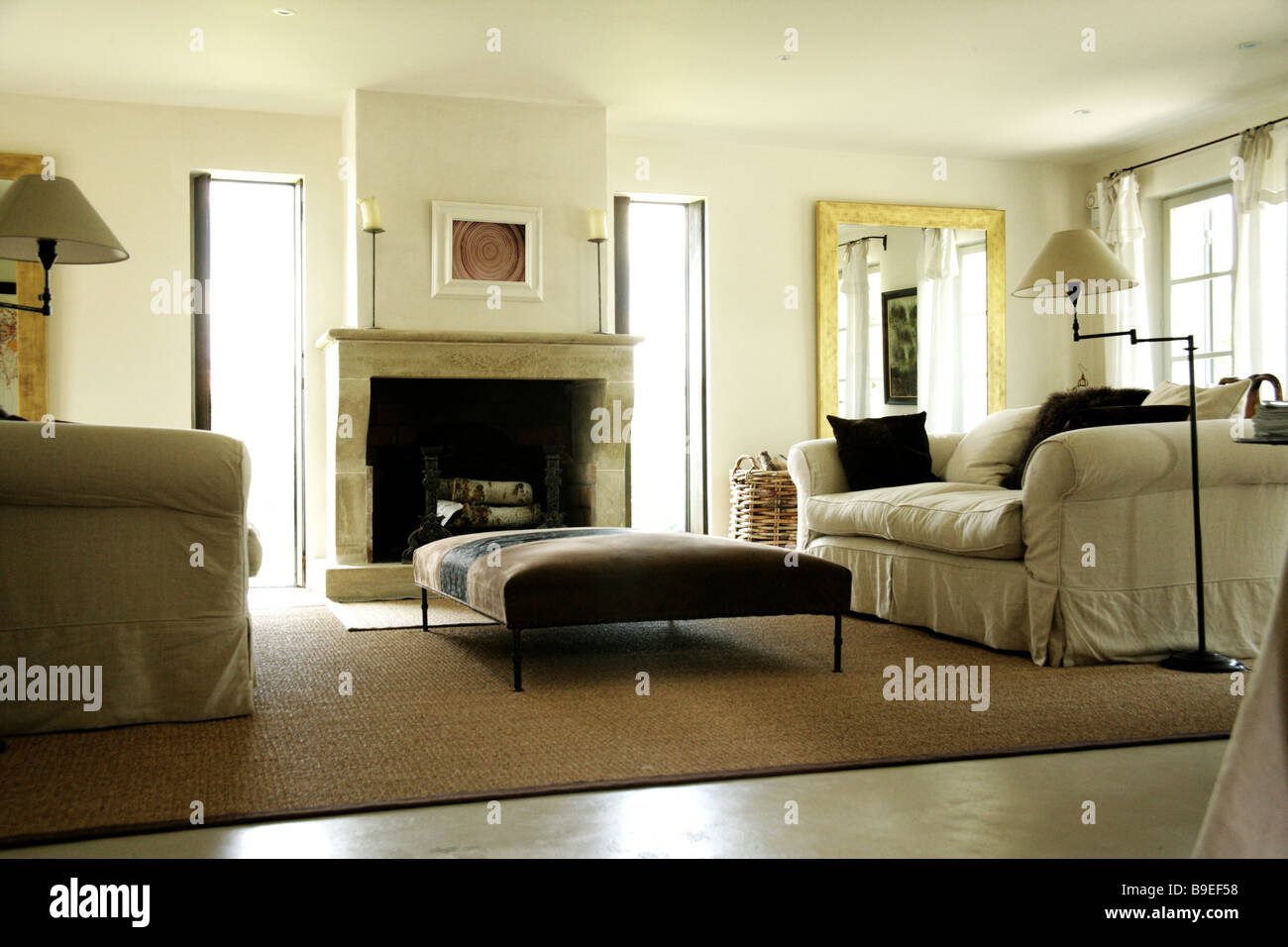 Low angle living room with comfy sofa Stock Photo - Alamy