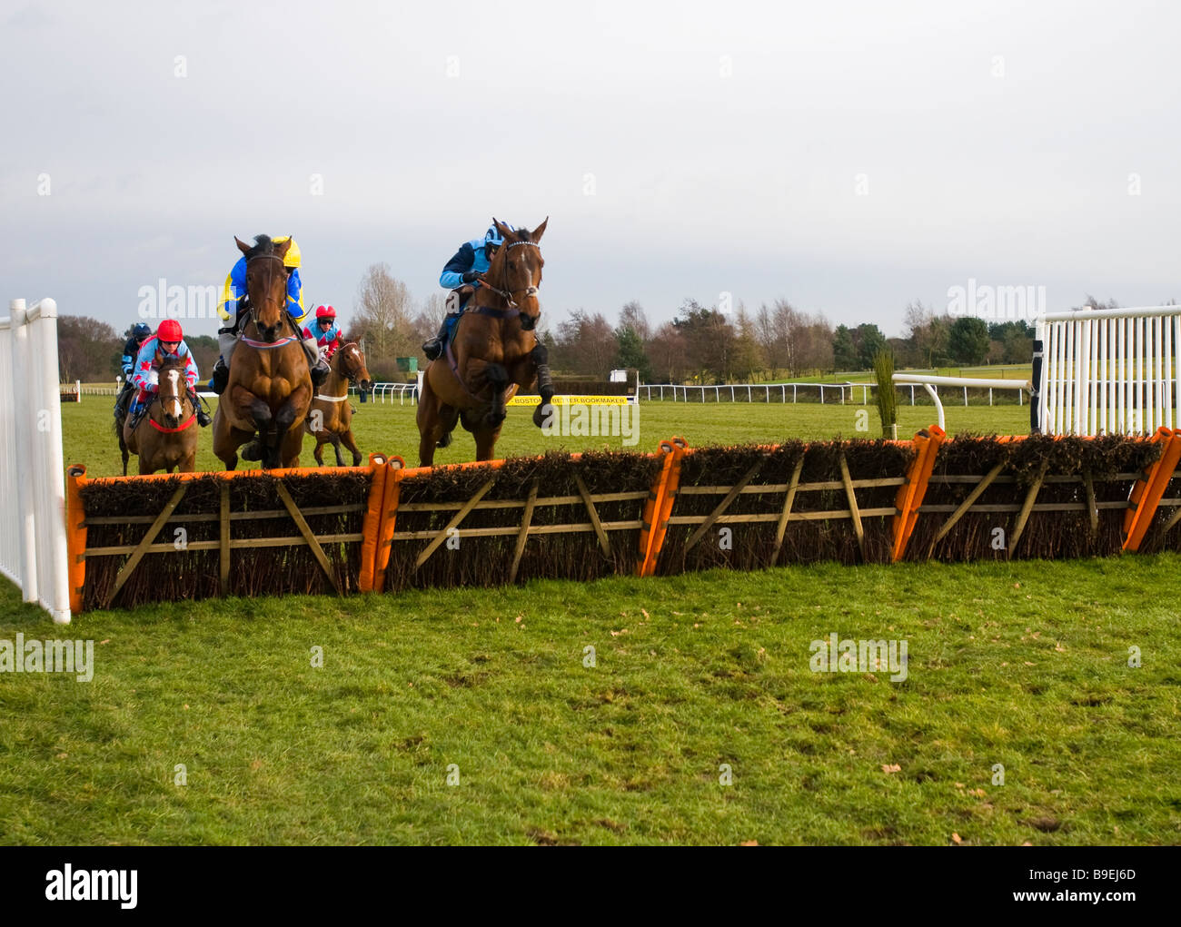 A hurdle race at Market Rasen races, Lincolnshire, England Stock Photo ...