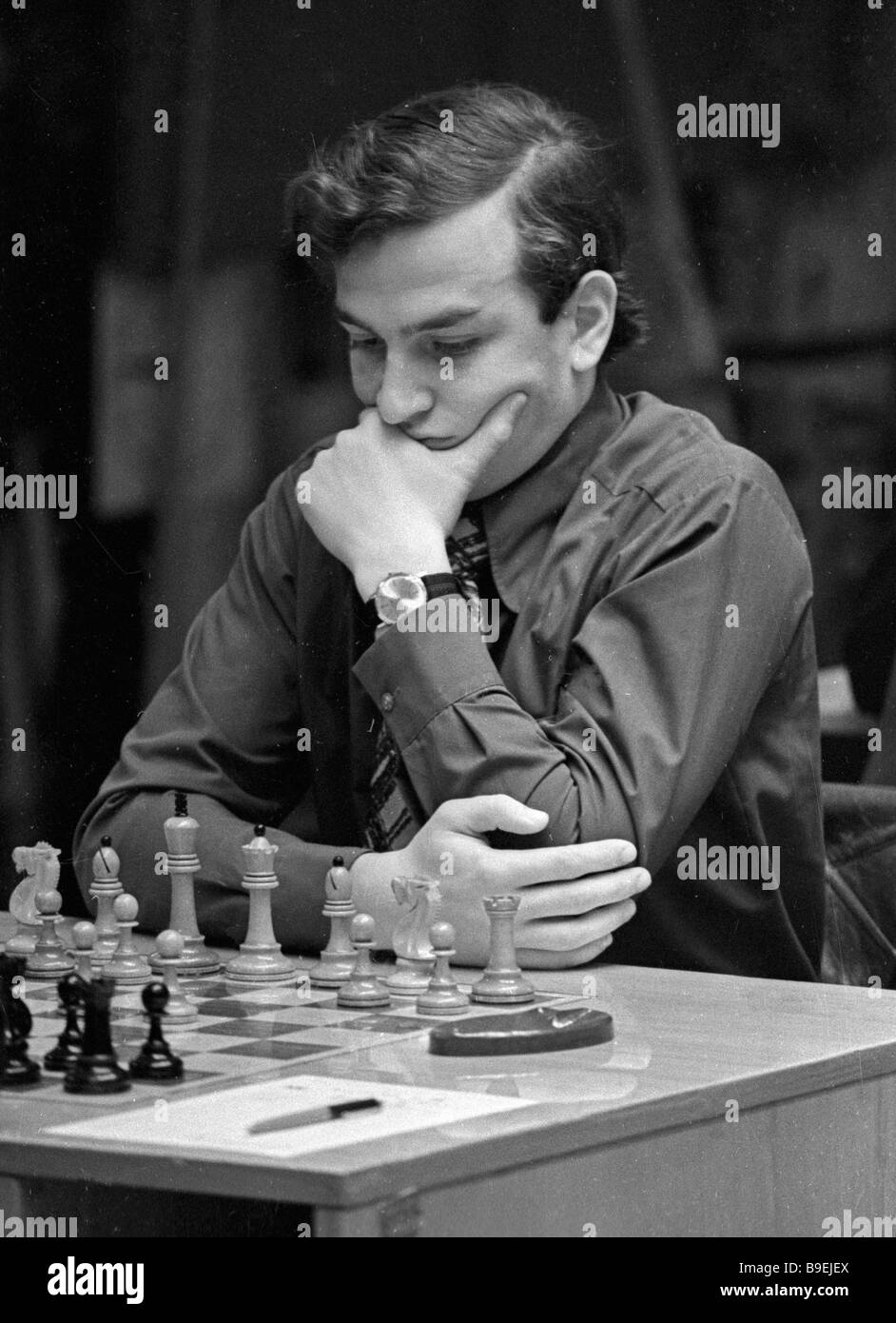 Chess player Alexander Belyavsky thinking over his next move Stock ...